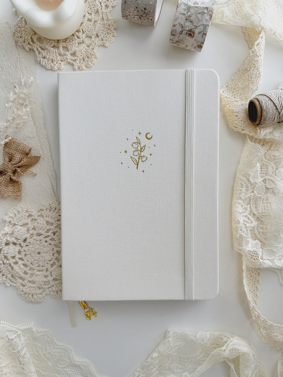 160 gsm | A5 | lily of the valley notebook (dotted) – leela journals