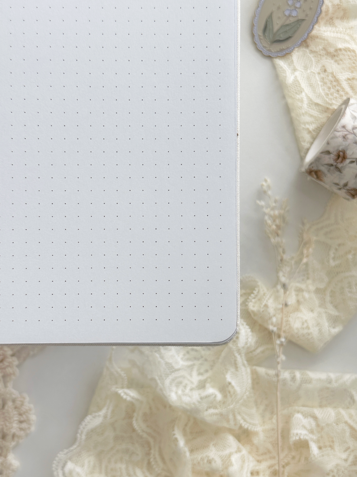 160 gsm | A5 | lily of the valley notebook (dotted) – leela journals
