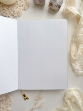 160 gsm | A5 | lily of the valley notebook (dotted) – leela journals